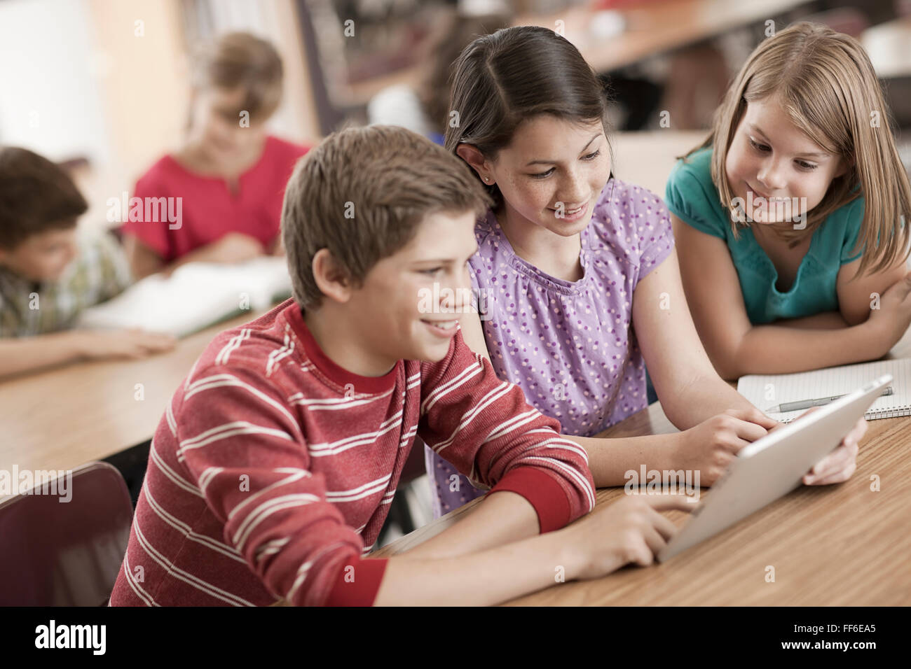 Group people using tablet hi-res stock photography and images - Alamy