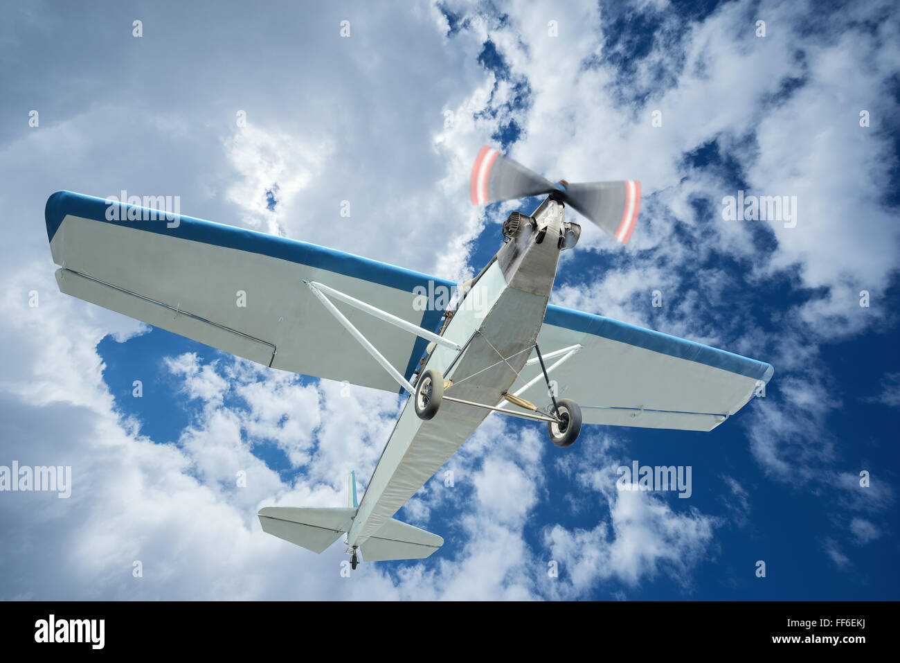 Old retro plane flies in the sky Stock Photo - Alamy