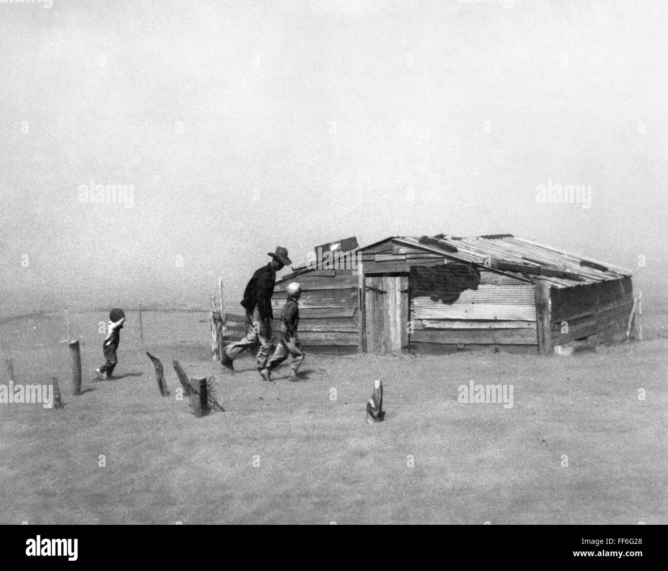 DROUGHT: DUST STORM, 1936. /nA farmer and his sons walking in the face ...