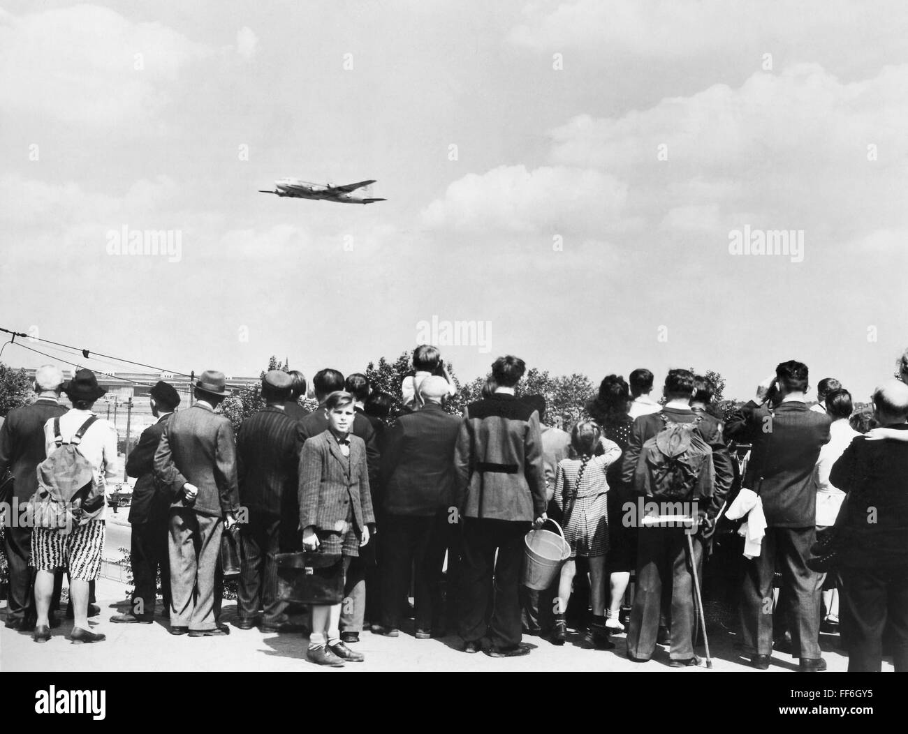 BERLIN: AIRLIFT, 1948. /nBerliners watching the arrival and departure ...
