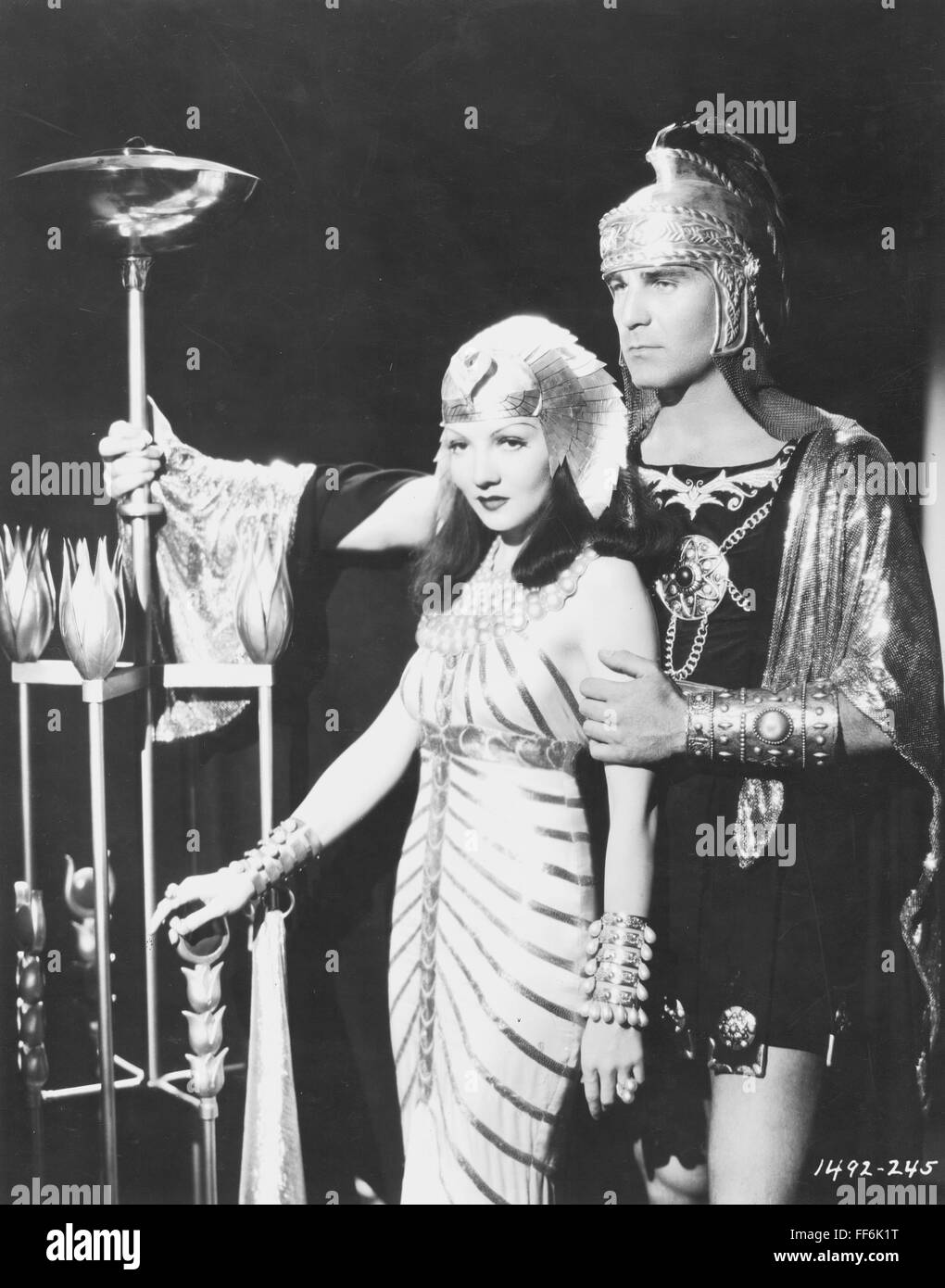 CLEOPATRA, 1934. /nClaudette Colbert as Cleopatra and Henry Wilcoxon as Marc Antony in the film ...