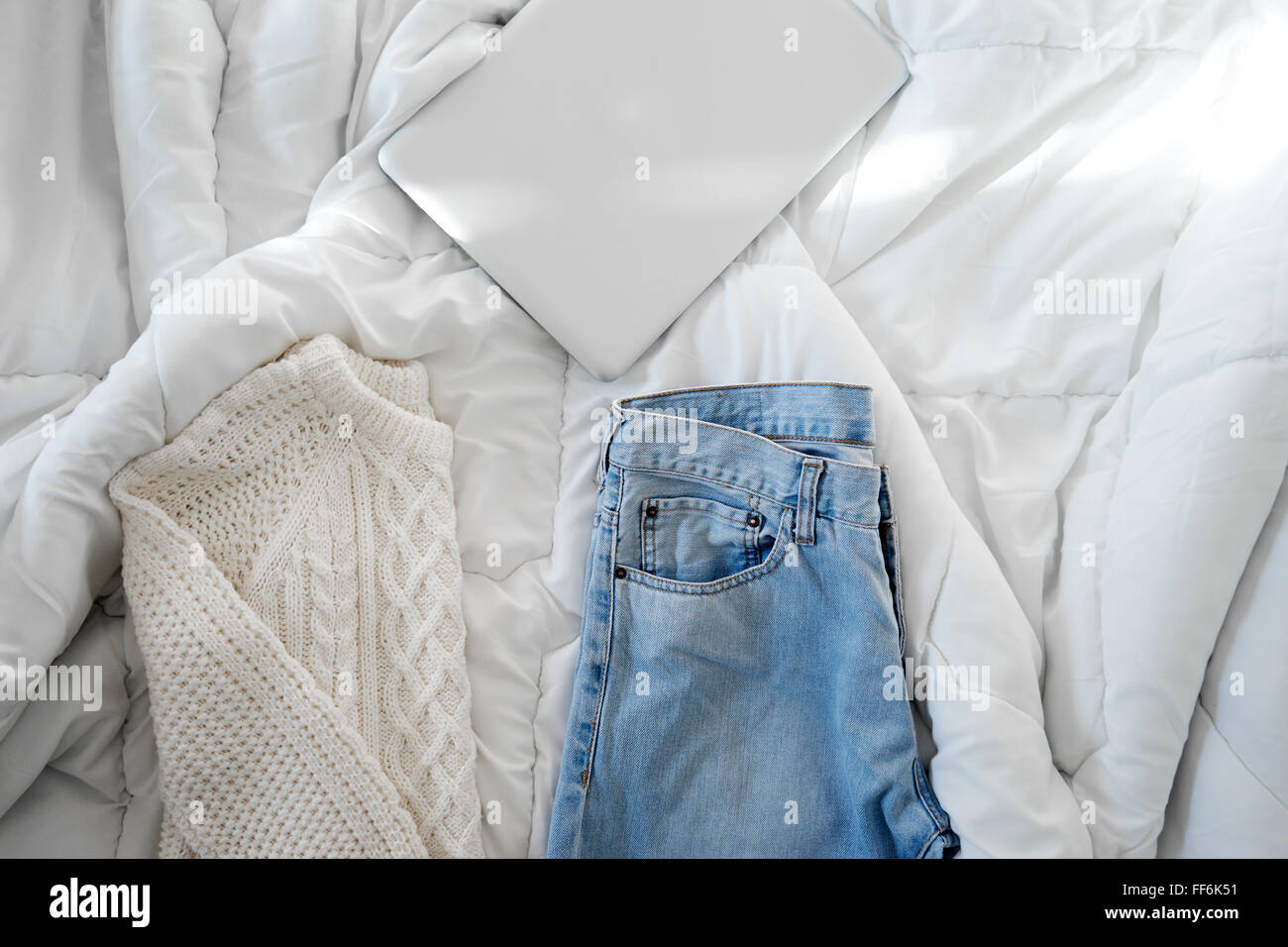 Clothes laid out on bed hi-res stock photography and images - Alamy