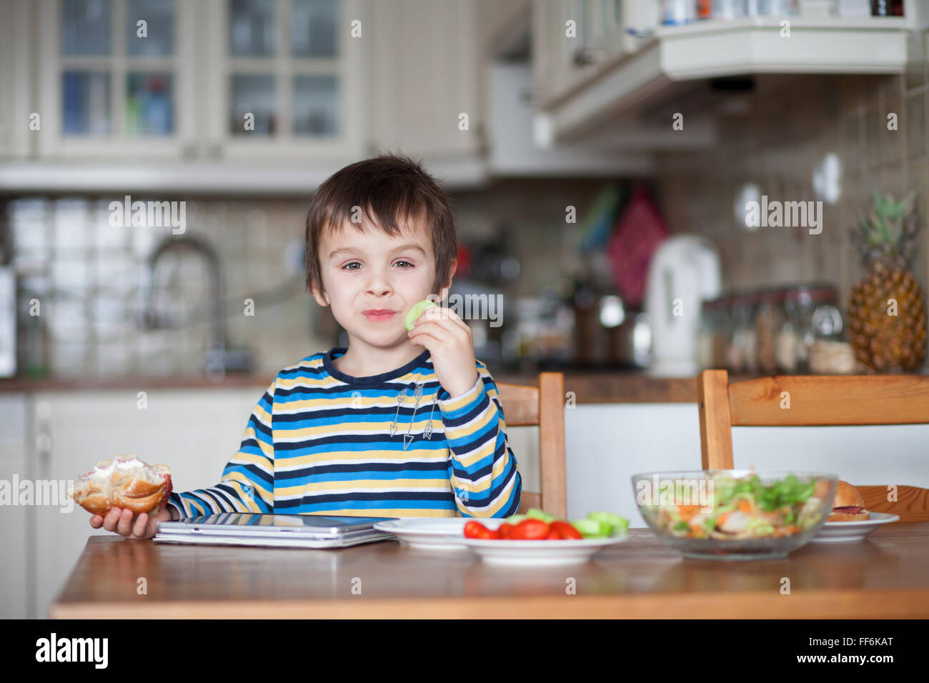 Boy eat sandwich hi-res stock photography and images - Alamy