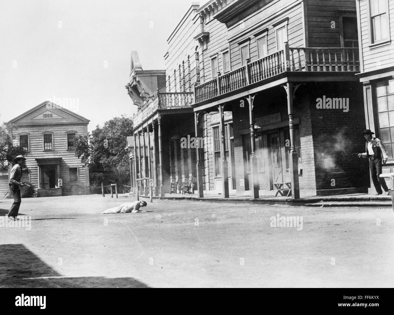 HIGH NOON, 1952. /nGunfight scene with Gary Cooper, Ian MacDonald and ...
