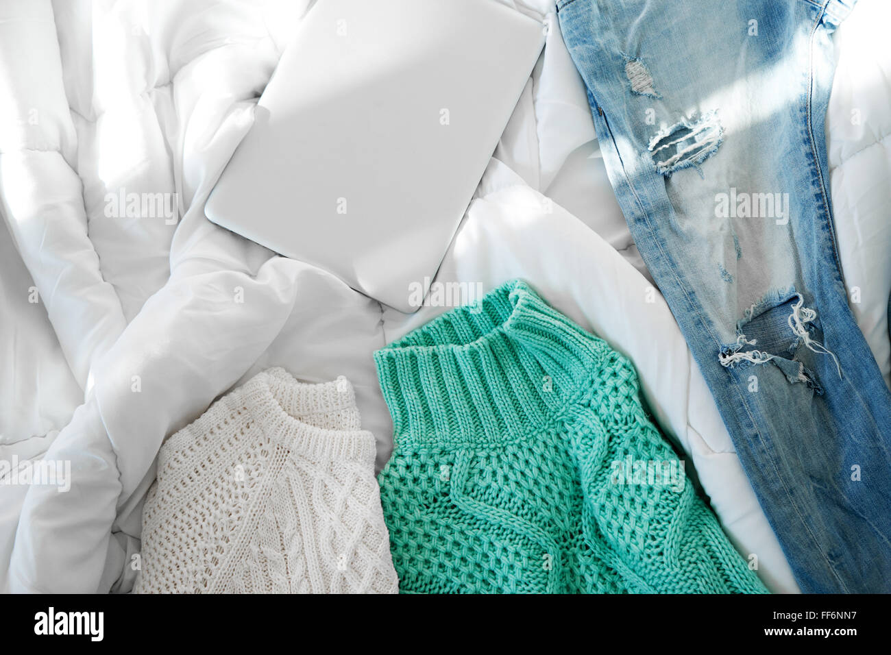 Clothes laid out on bed hi-res stock photography and images - Alamy