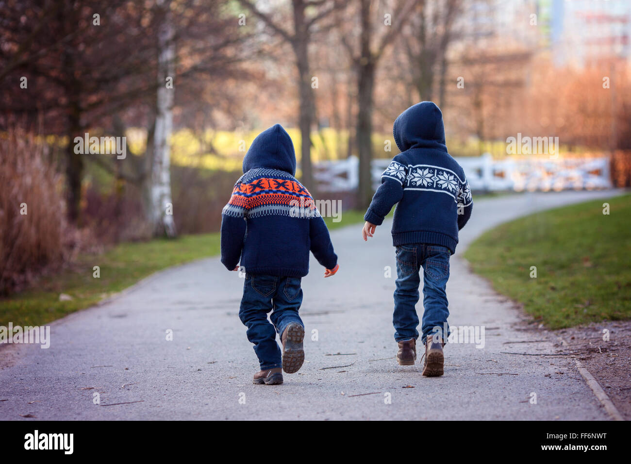 Boy running away grass sun hi-res stock photography and images - Alamy