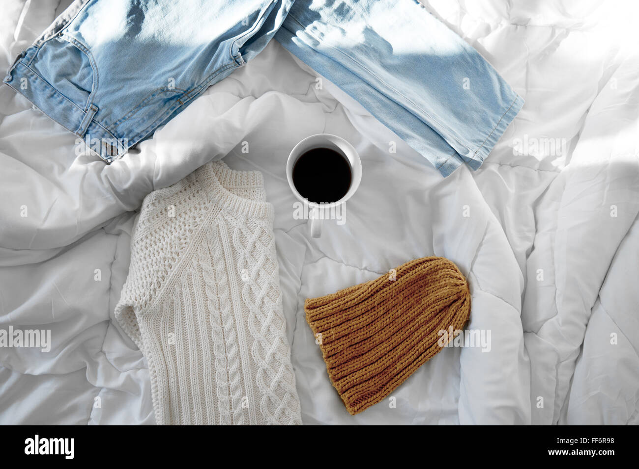 Clothes laid out on bed hi-res stock photography and images - Alamy