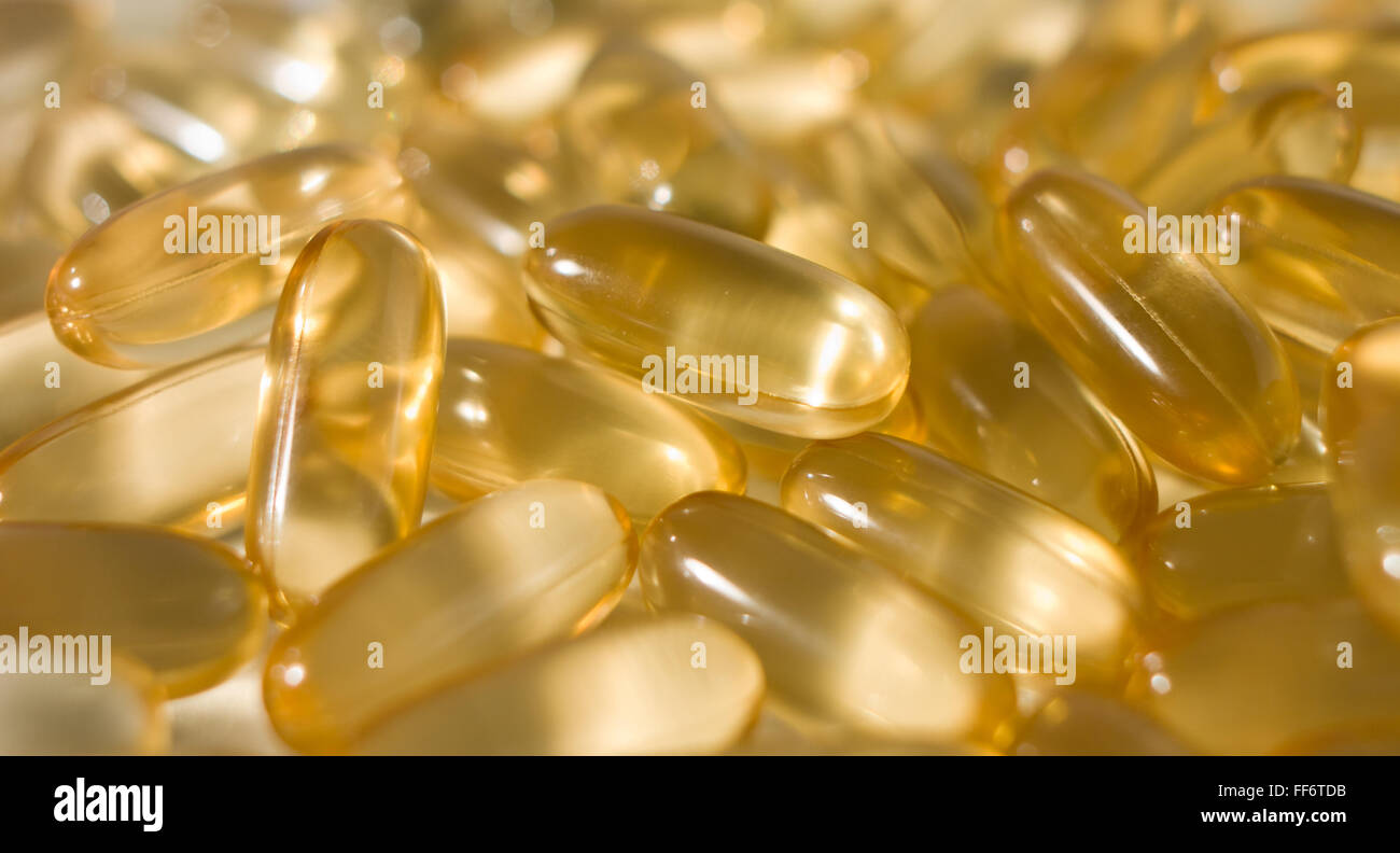 Cod-liver oil yellow tablets Stock Photo - Alamy