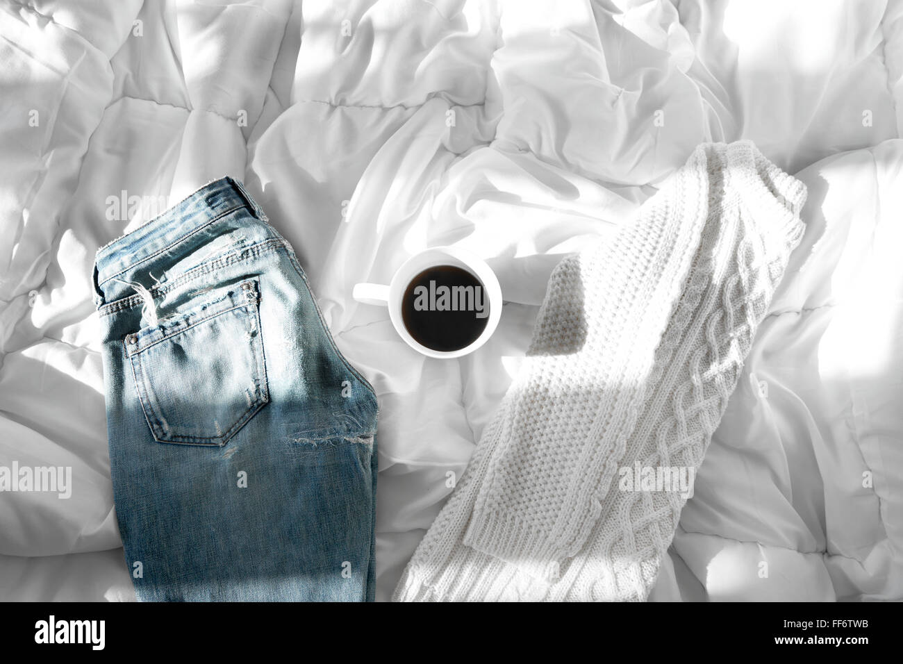 Clothes laid out on bed hi-res stock photography and images - Alamy