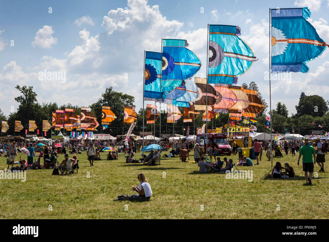 Flags fly in the main arena. WOMAD 2014, festival of world music and ...