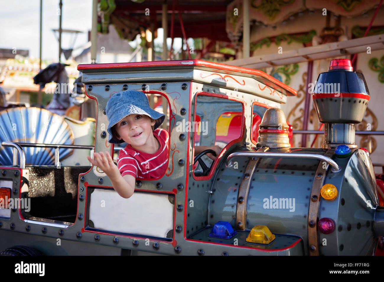 Merry go round train hi-res stock photography and images - Alamy