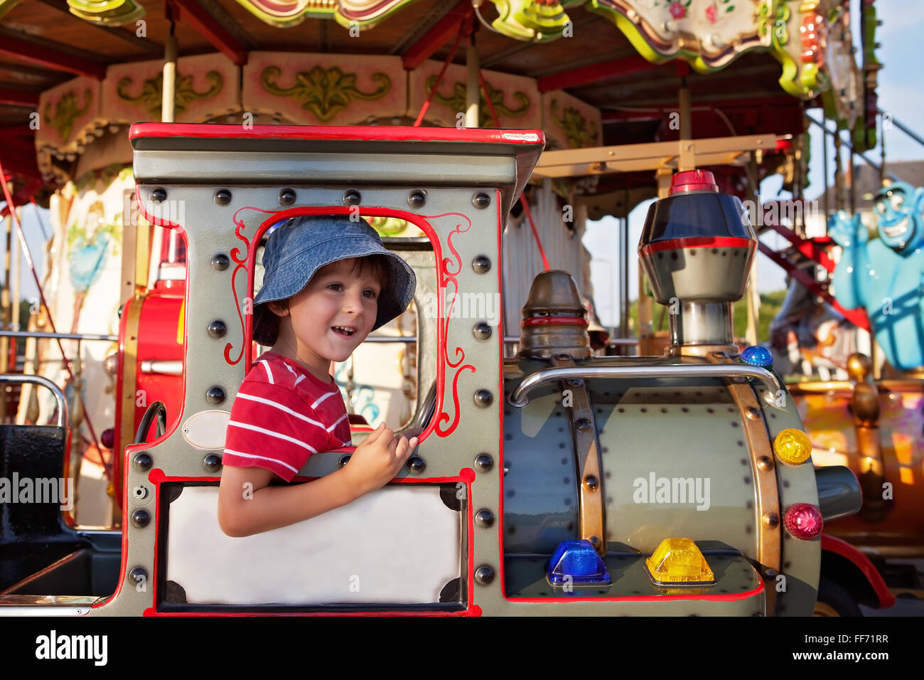Merry go round train hi-res stock photography and images - Alamy
