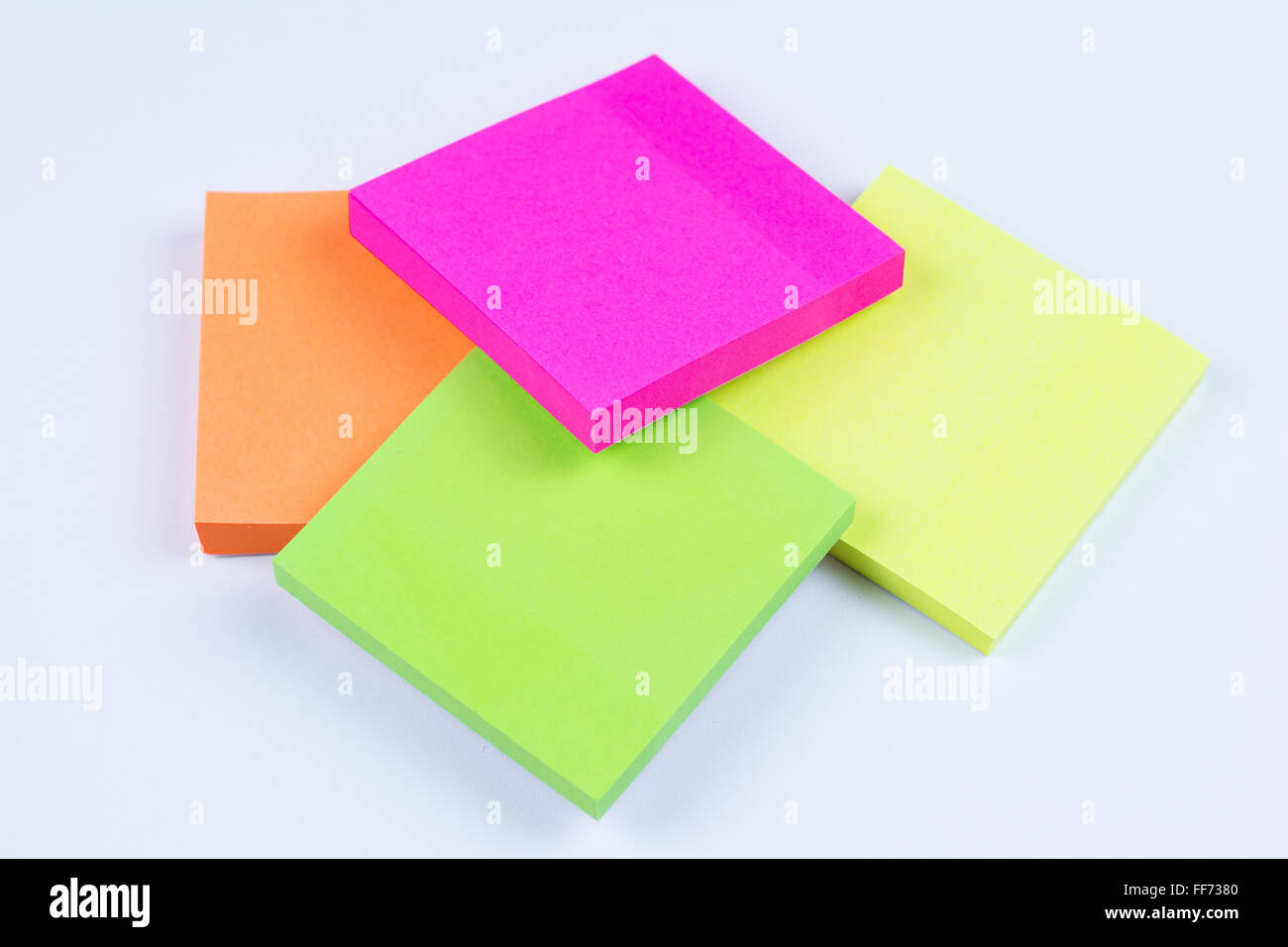Four colored sticky notes Stock Photo - Alamy