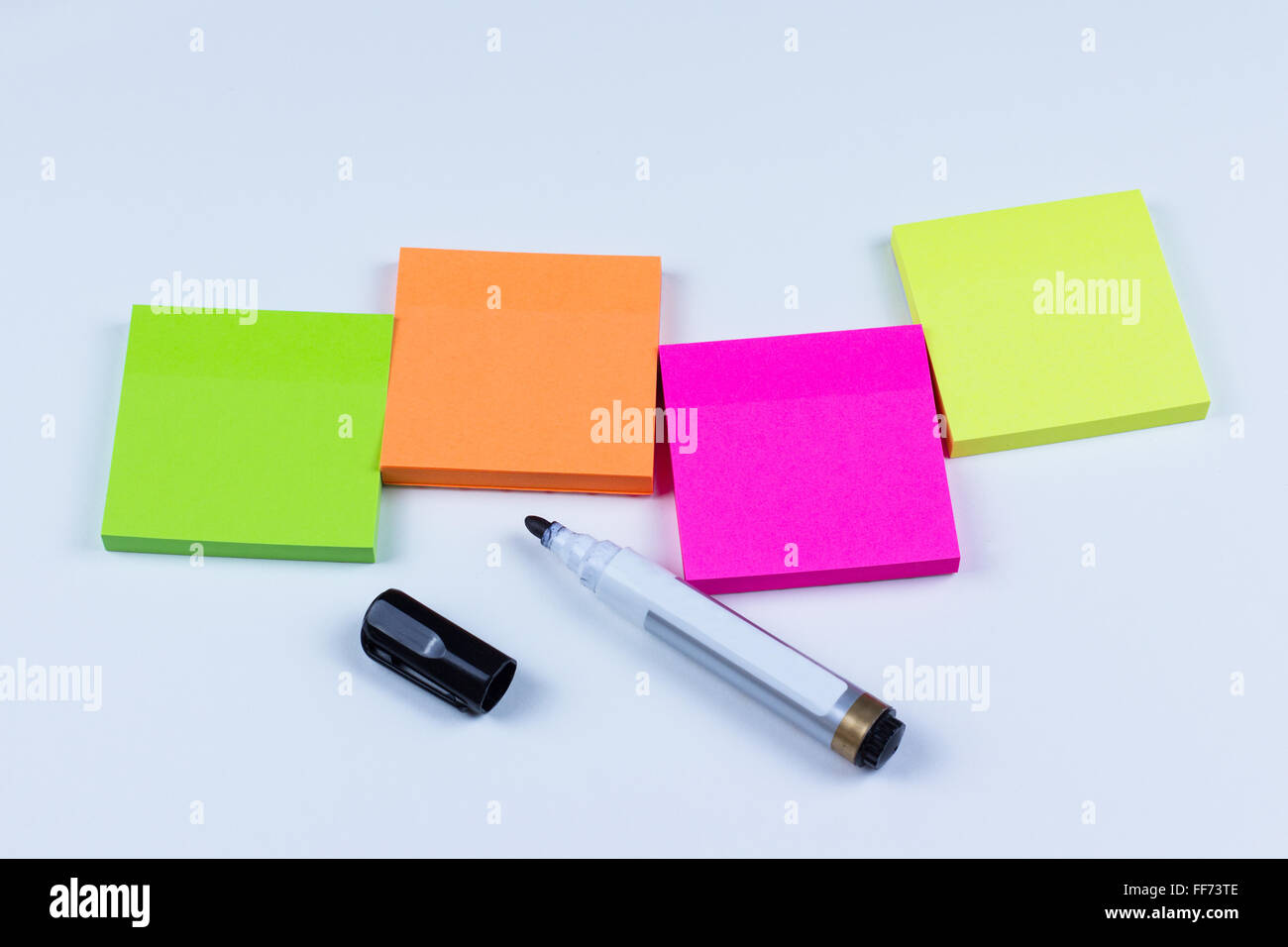 Arrangement of colored sticky notes with marker pen near Stock Photo ...