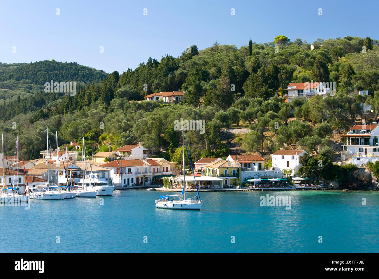 Lakka, Paxos, Ionian Islands, Greece. View to the village across the ...