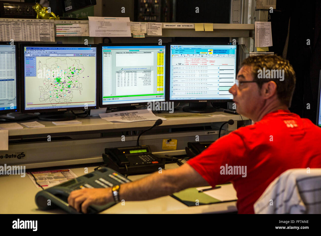 A male Belgian traffic controller monitors tram traffic flow on the ...