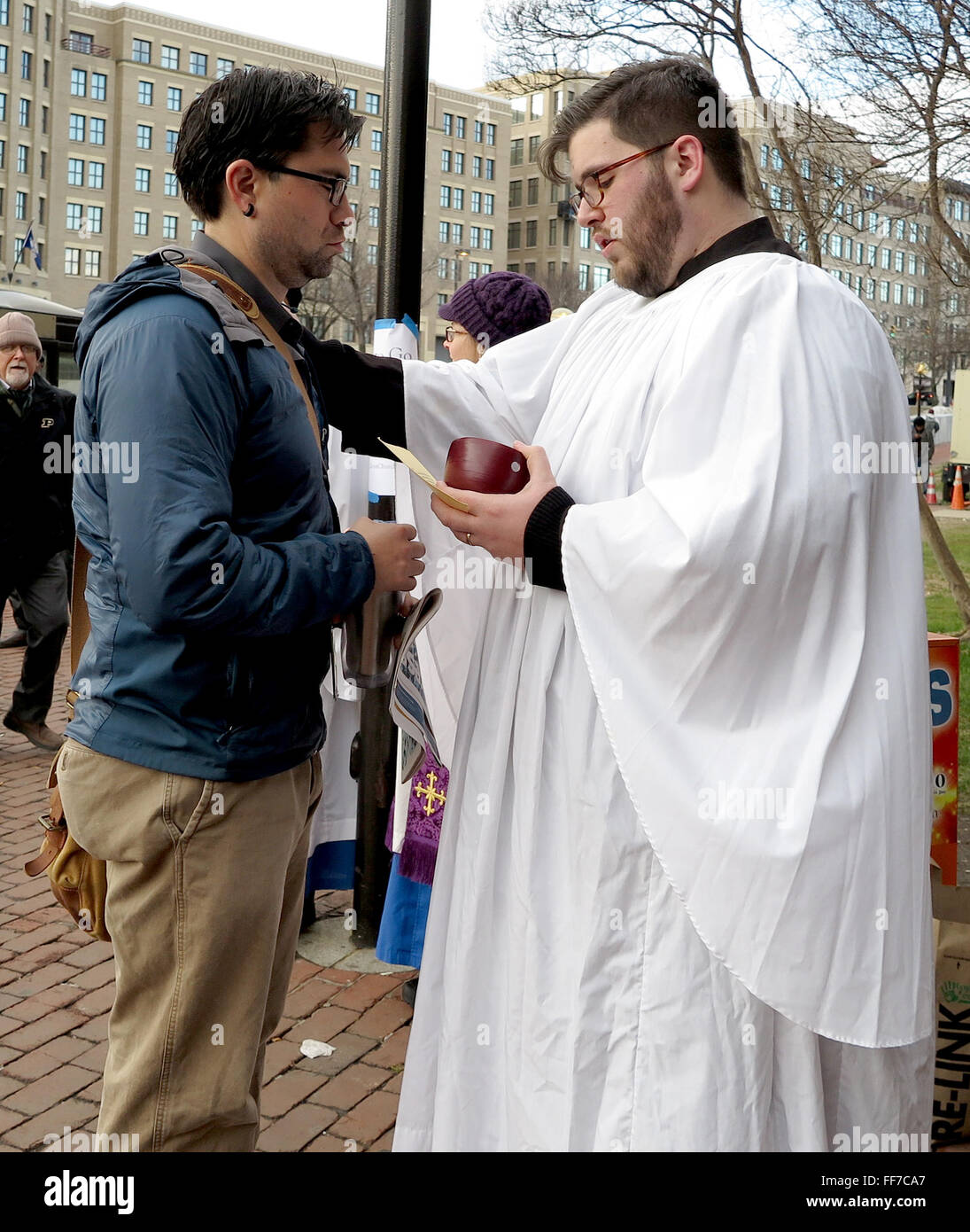 Ash wednesday priest hi-res stock photography and images - Alamy