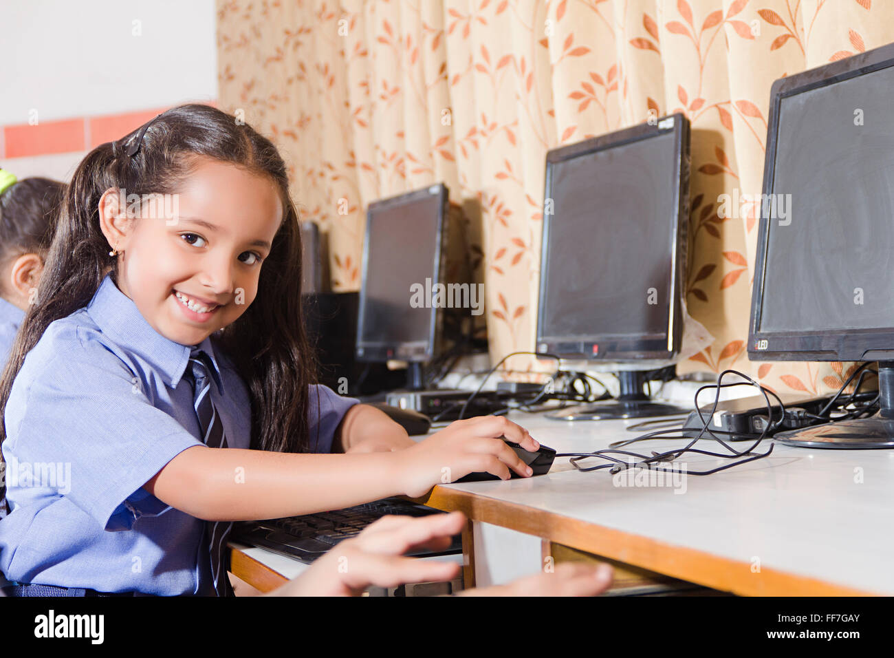 Children working together on computer hi-res stock photography and ...