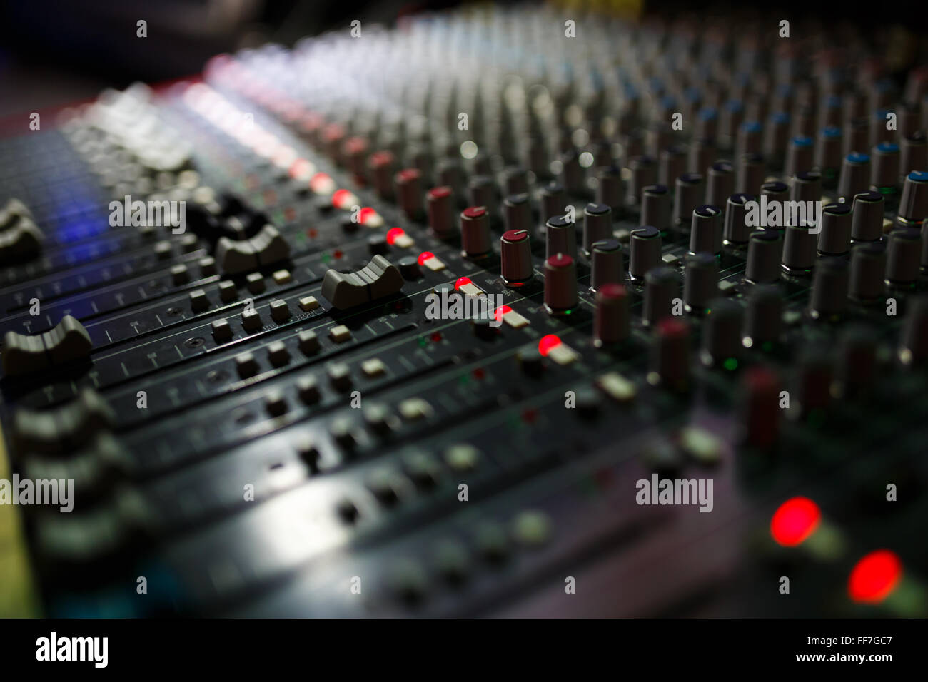 Sound control panel in the color light Stock Photo - Alamy