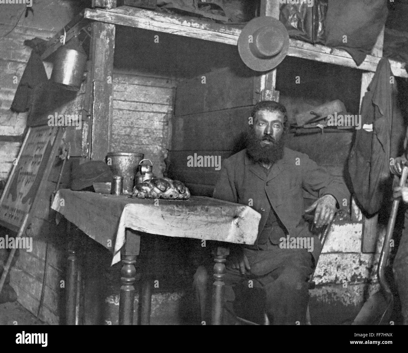 TENEMENT LIFE, c1890. /nA Jewish cobbler preparing for Sabbath Eve in a ...
