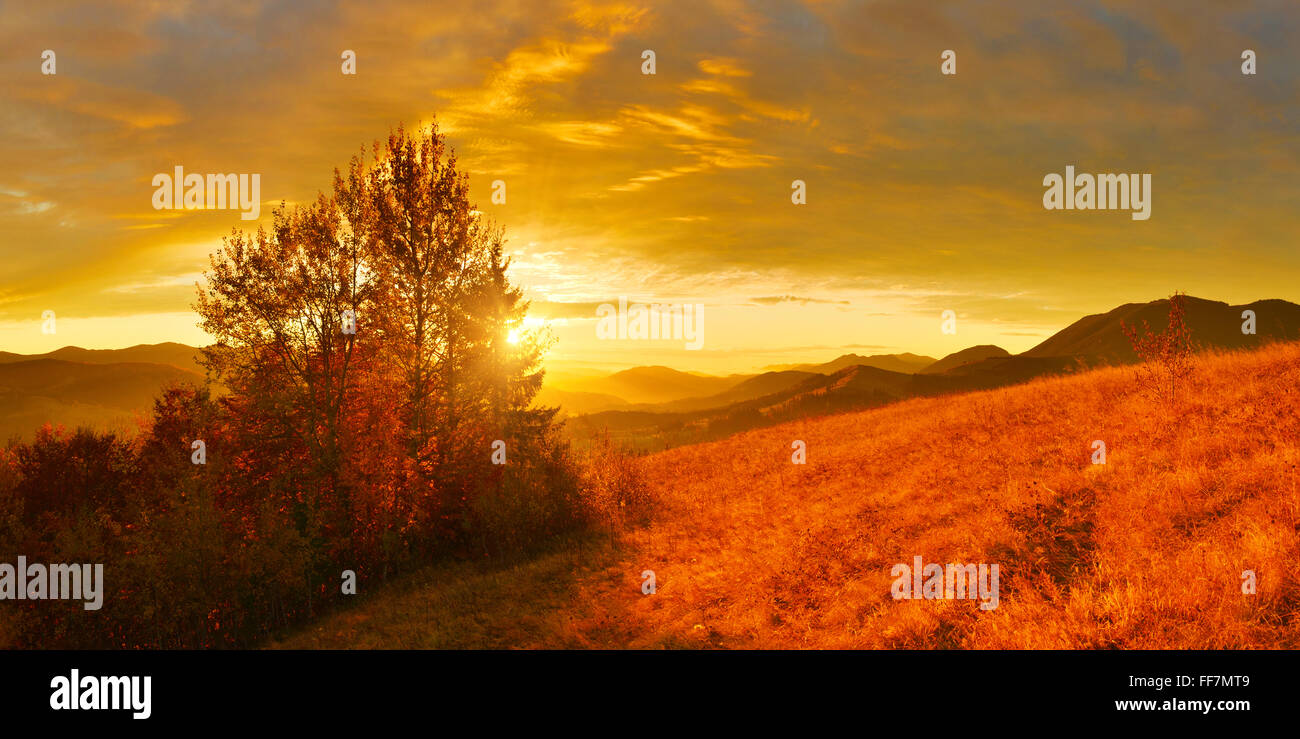 Rising sun above autumn mountains in the indian summer Stock Photo - Alamy