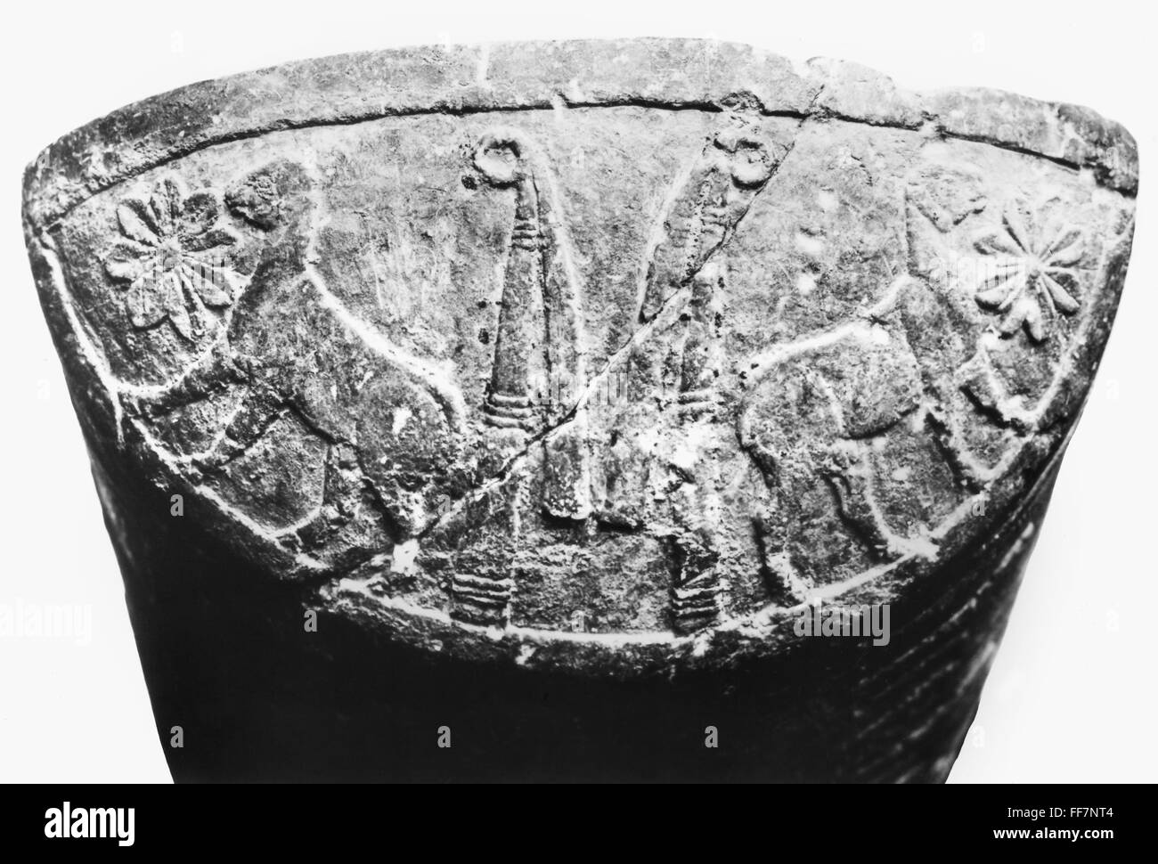 SUMER: DRINKING TROUGH. /nEnd view of a carved limestone drinking ...