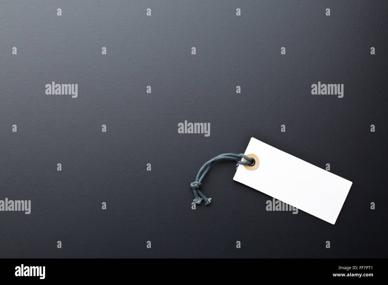paper label on black background Stock Photo - Alamy