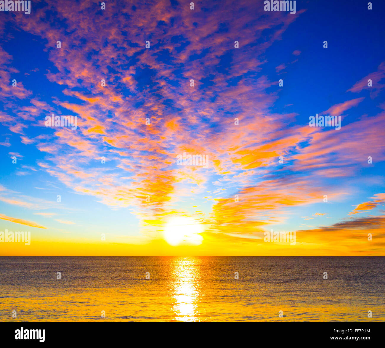 Beautiful sunset over the ocean Stock Photo - Alamy