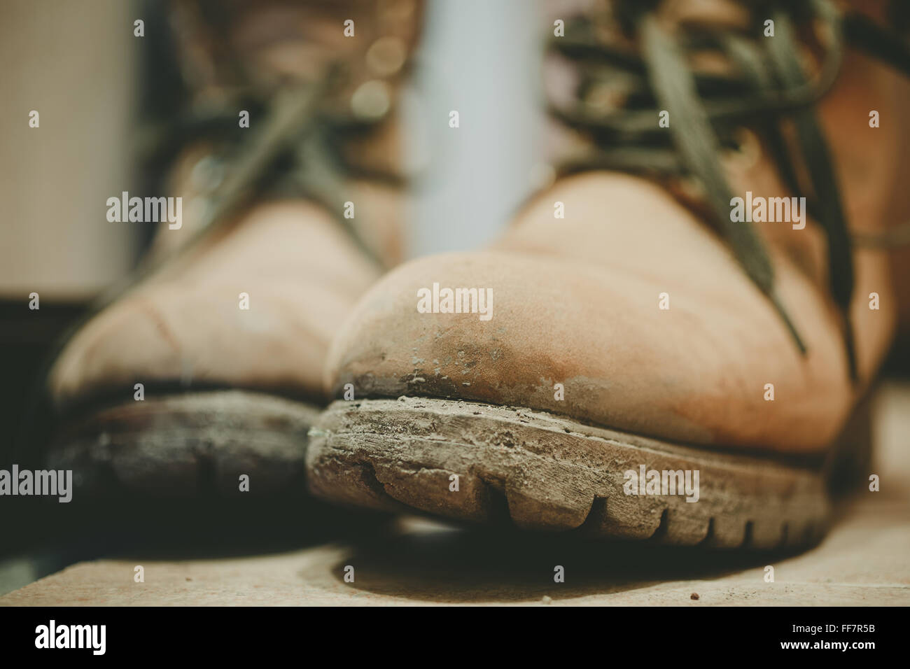 Old and Dirty boots in mud Stock Photo - Alamy
