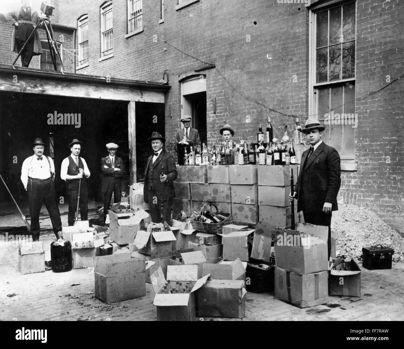 PROHIBITION, 1922. /nRevenue agents with confiscated bootleg liquor at ...