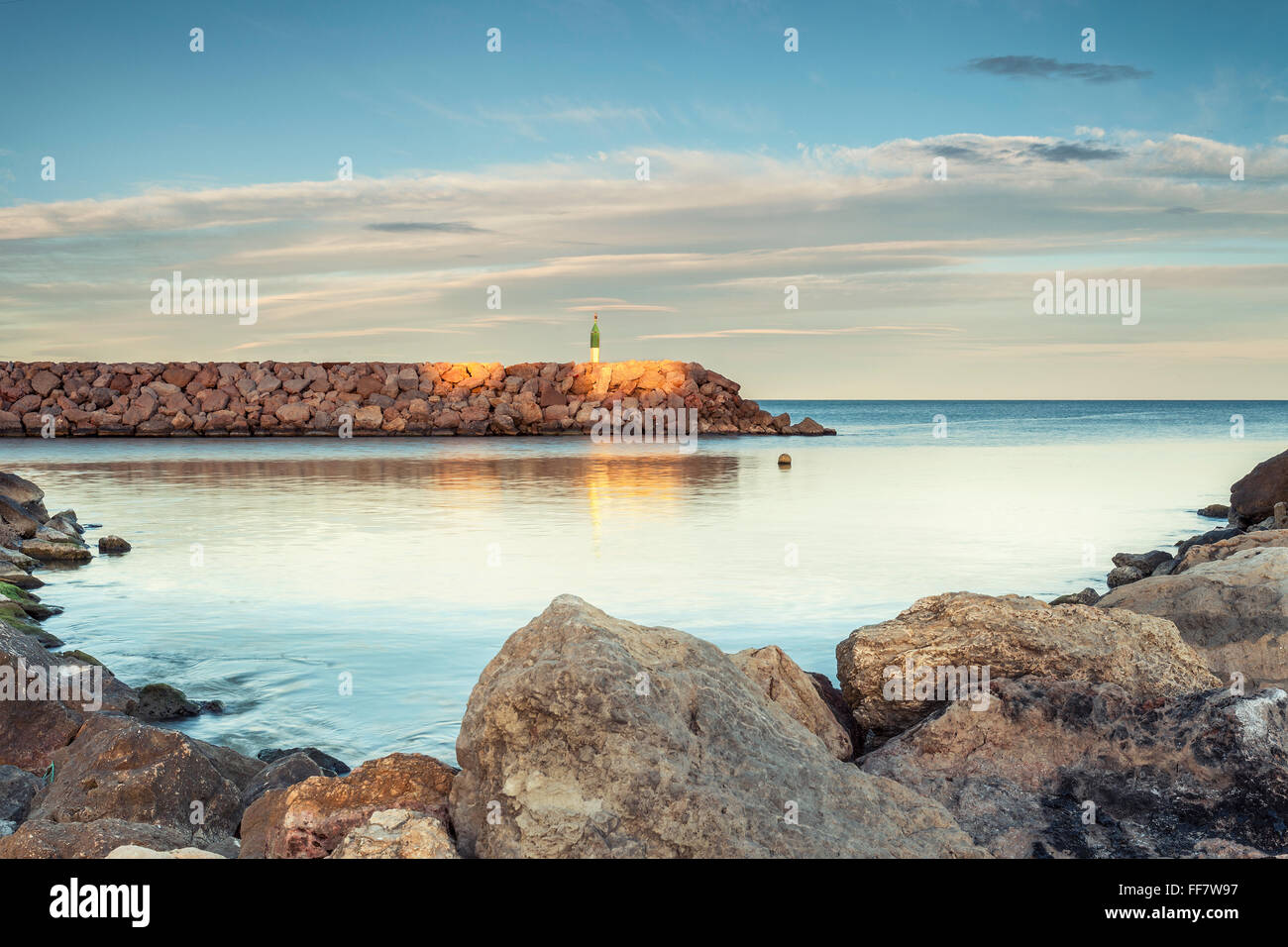 Sandy beach with waves of the see Stock Photo - Alamy