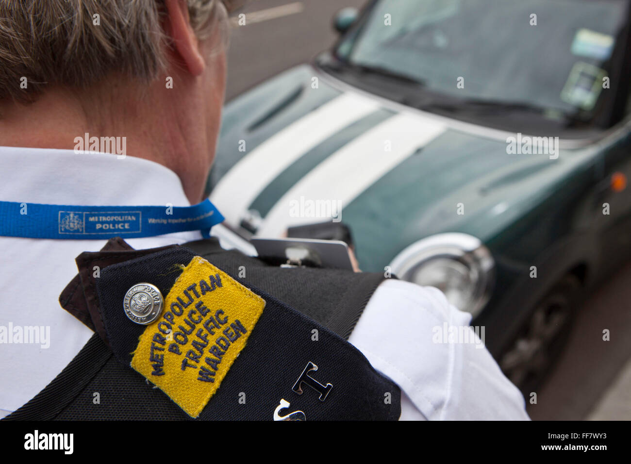 A Metropolitan Police traffic warden gives a ticket out on the Red ...