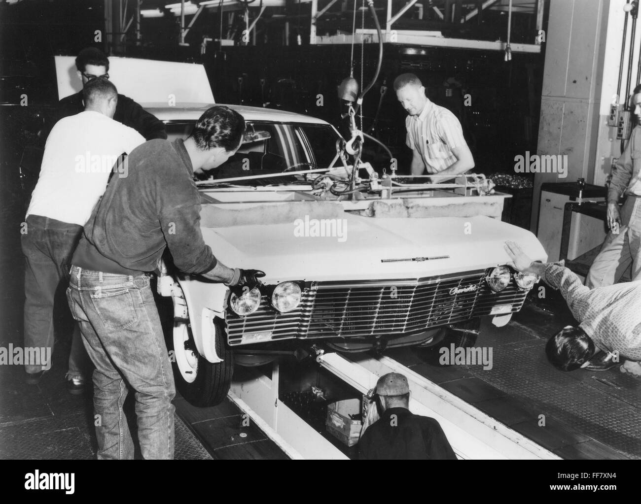 FACTORY: CHEVROLET, 1960s. /nA Chevrolet assembley line in the early ...