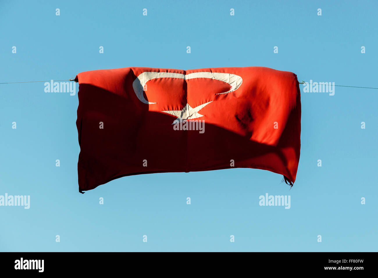 A Turkish flag flying over the city of Istanbul in Turkey Stock Photo ...