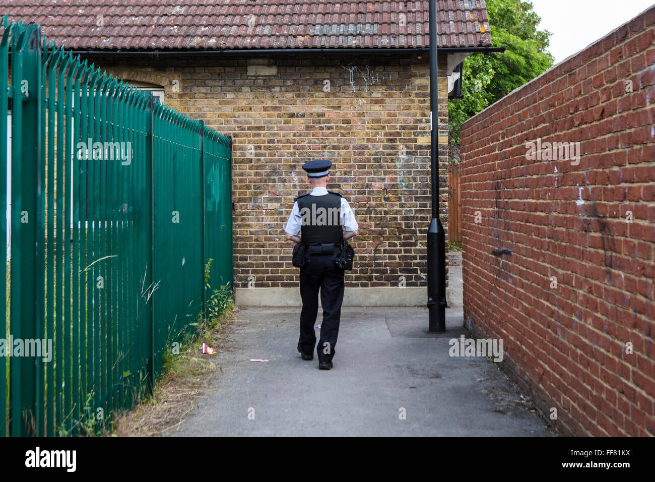 A Police Community Support Officer's (PCSO) badge on the beat in ...