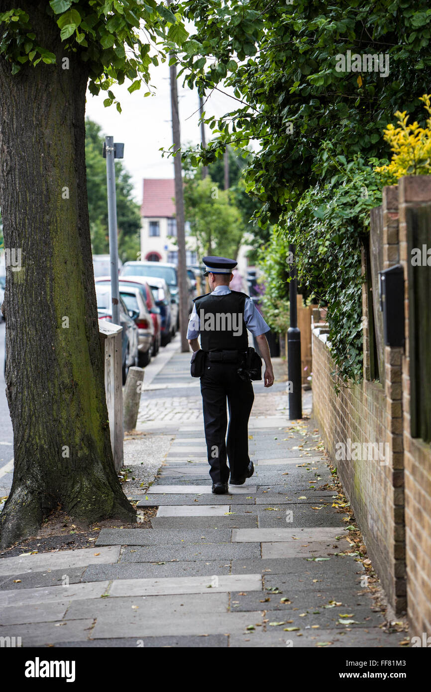 A Police Community Support Officer's (PCSO) badge on the beat in ...