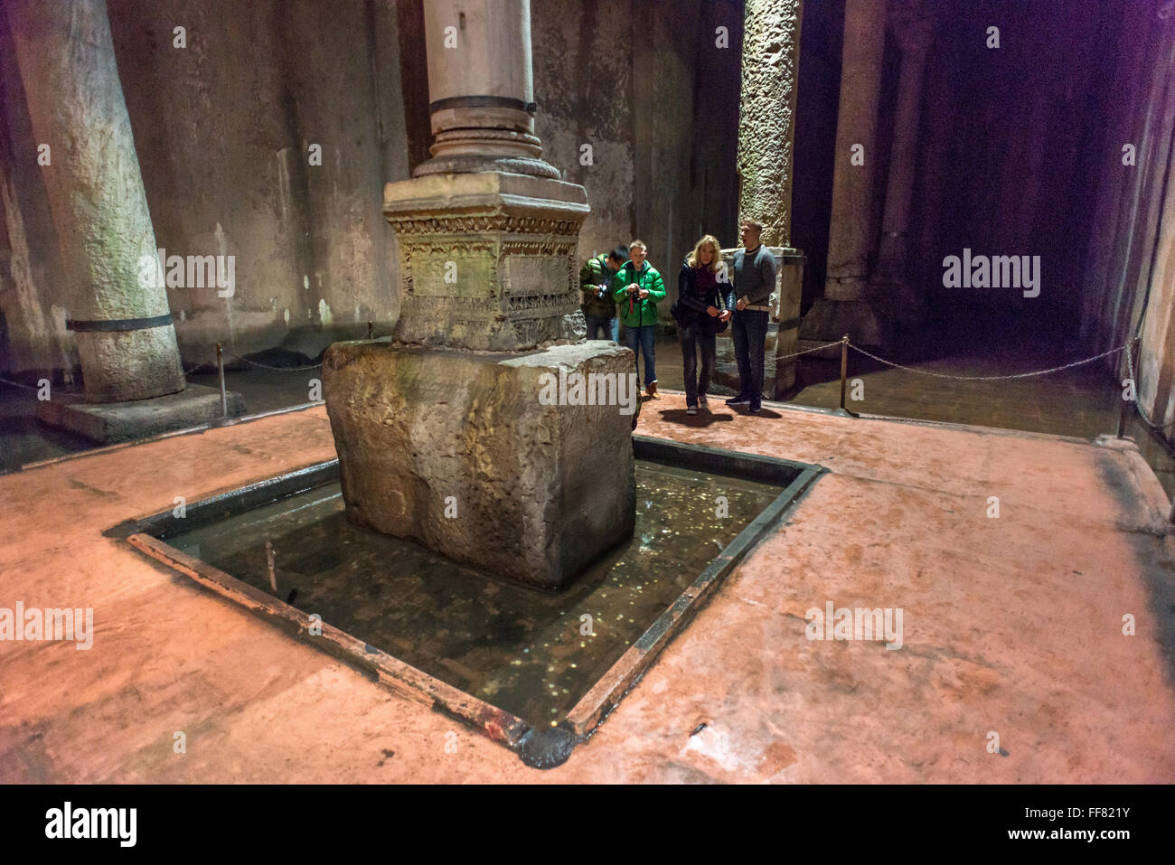 Column featuring a statue of Medusa inside the Basilica Cistern that ...