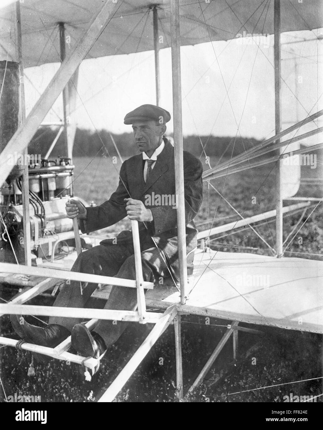 WILBUR WRIGHT (1867-1912). /nAmerican aviation pioneer. At the controls of an early Wright ...