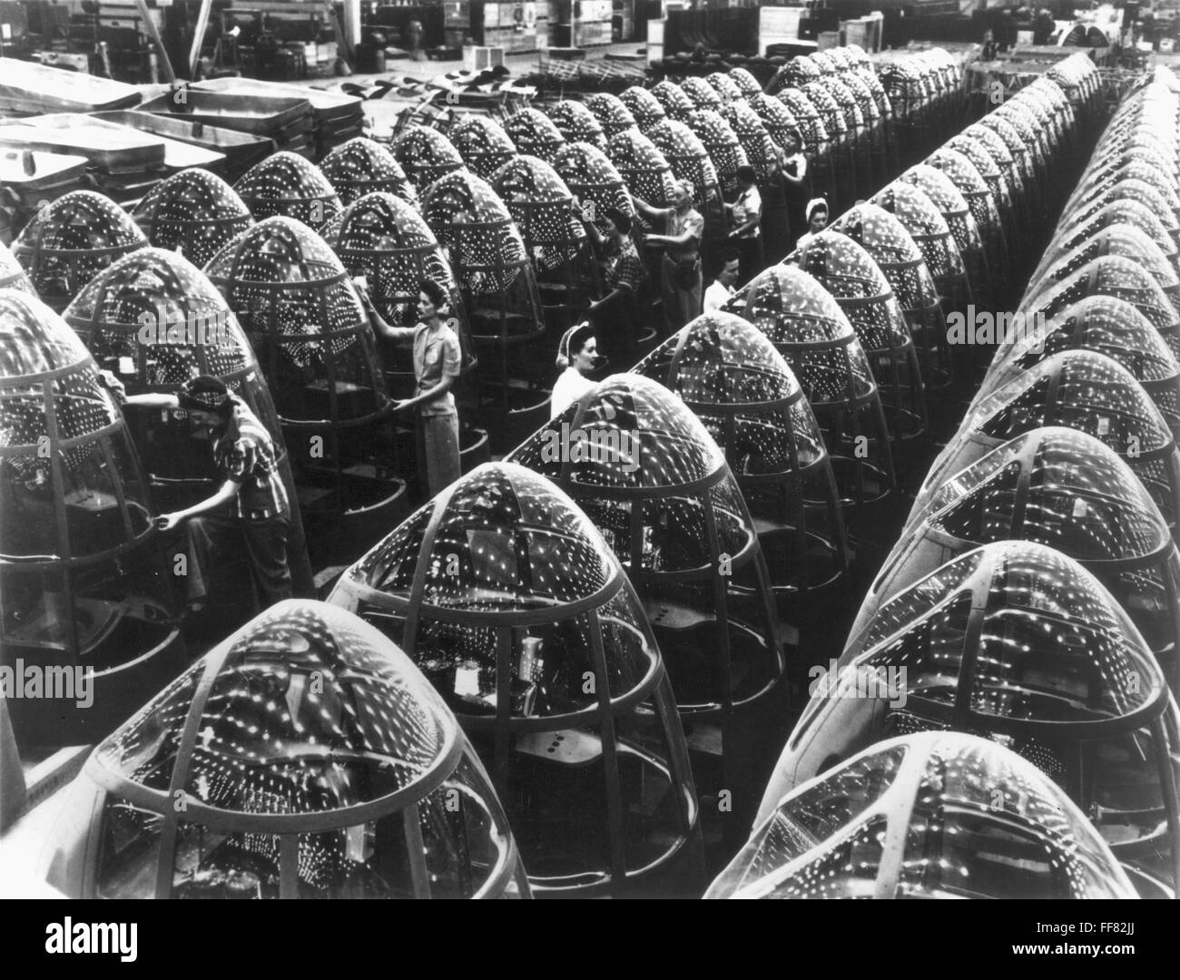 WORLD WAR II: FACTORY, 1942. /nWomen workers preparing transparent ...
