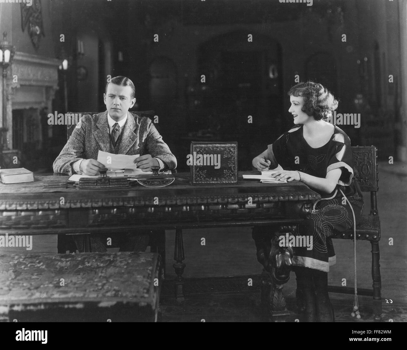 OFFICE SCENE, 1920s. /nA silent movie still, 1920s Stock Photo - Alamy