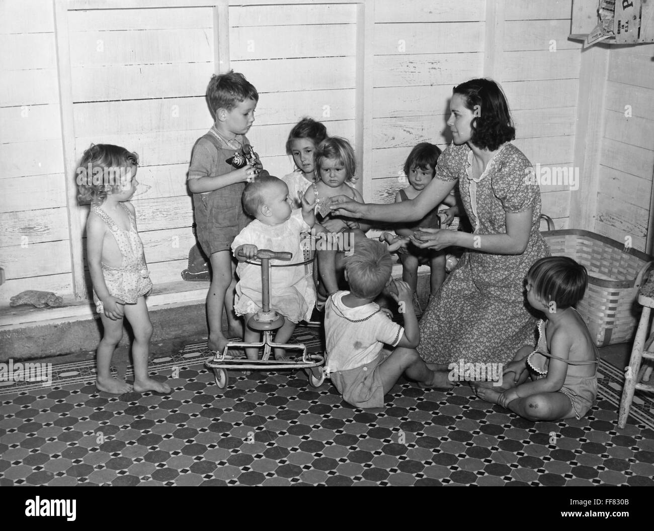 MIGRANT MOTHER, c1930's. /nAn impoverished mother with her eight young ...