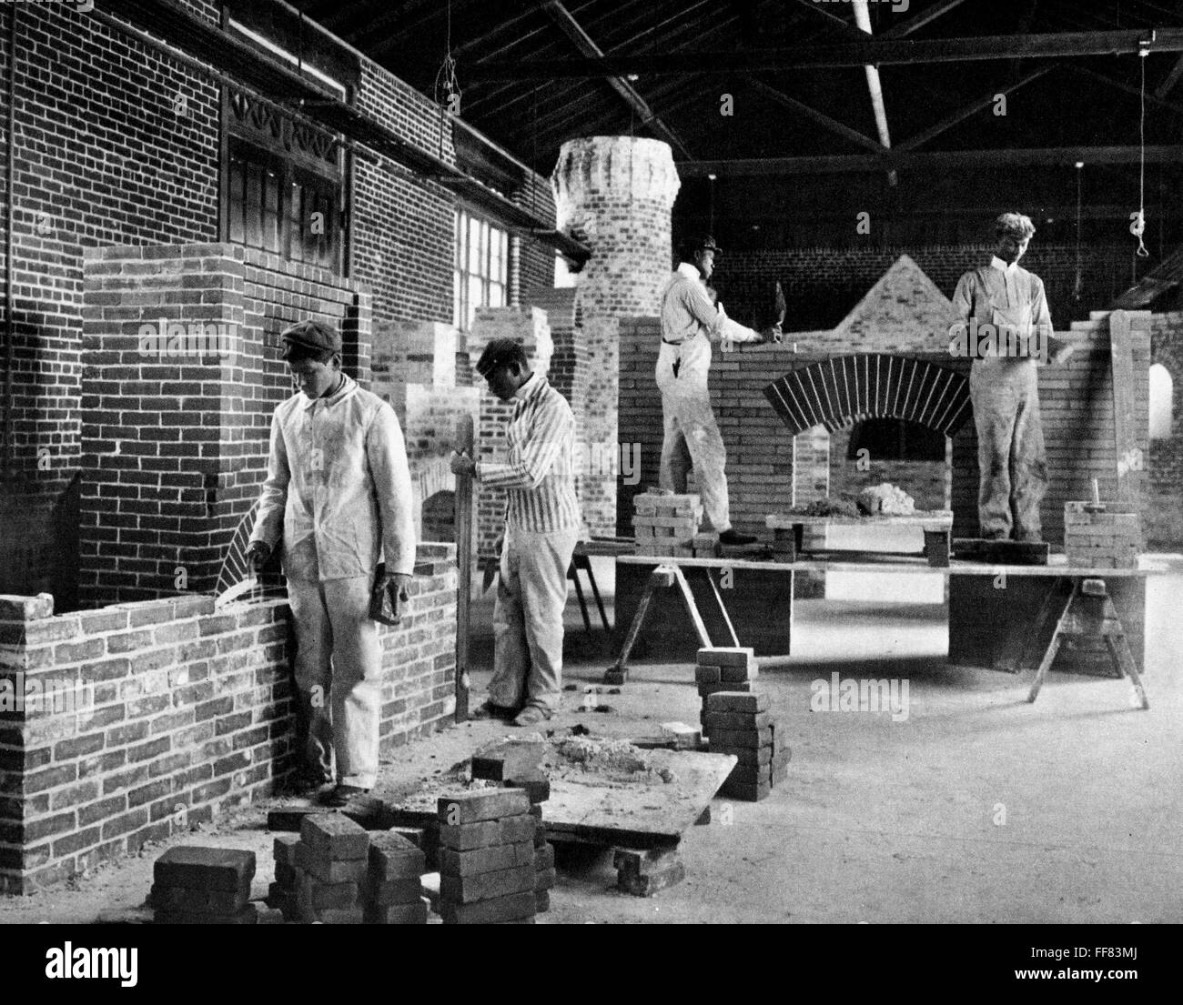 HAMPTON INSTITUTE, 1899. /nTrade school class in brick laying ...