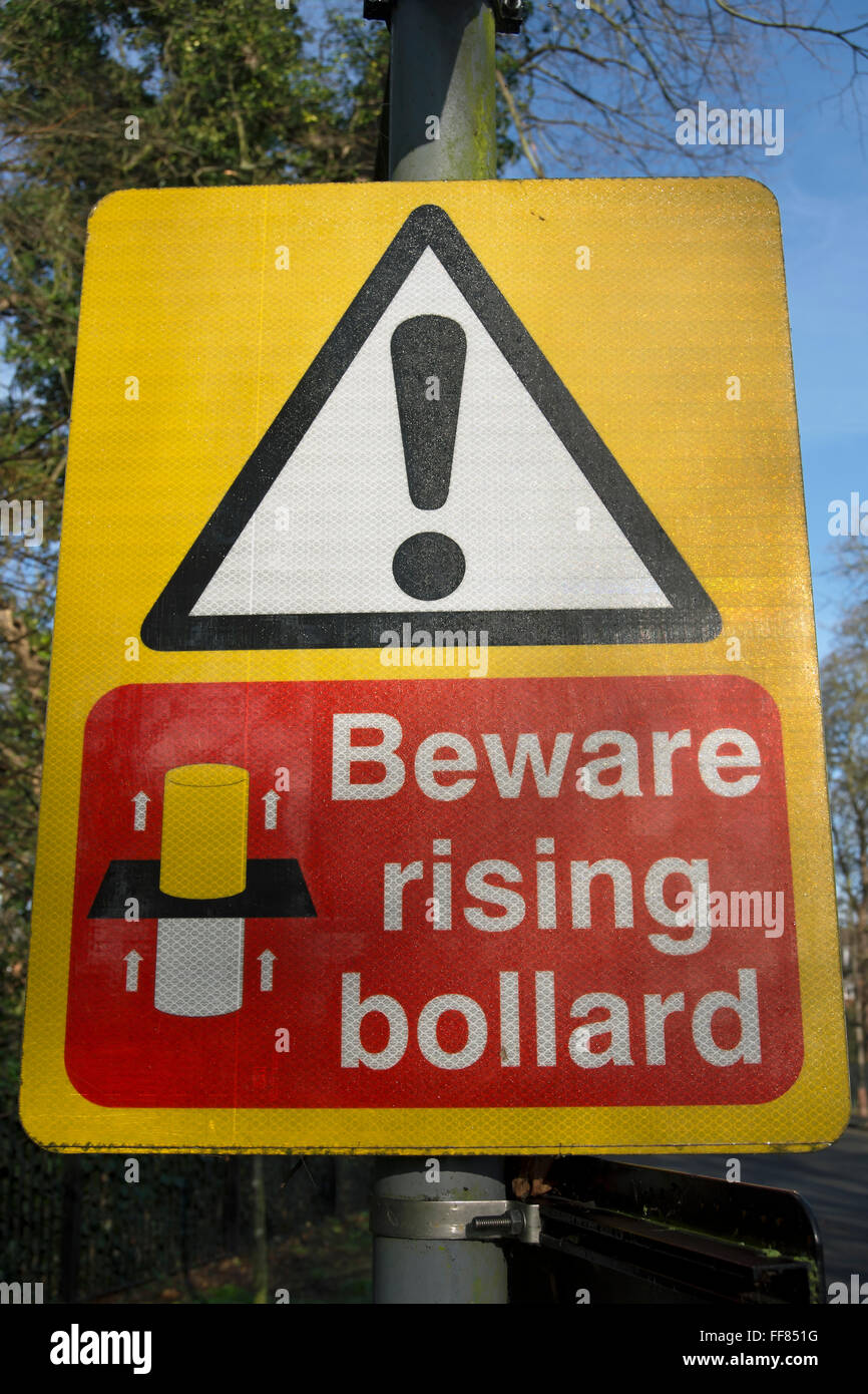 beware rising bollard sign, with exclamation mark, in barge walk ...