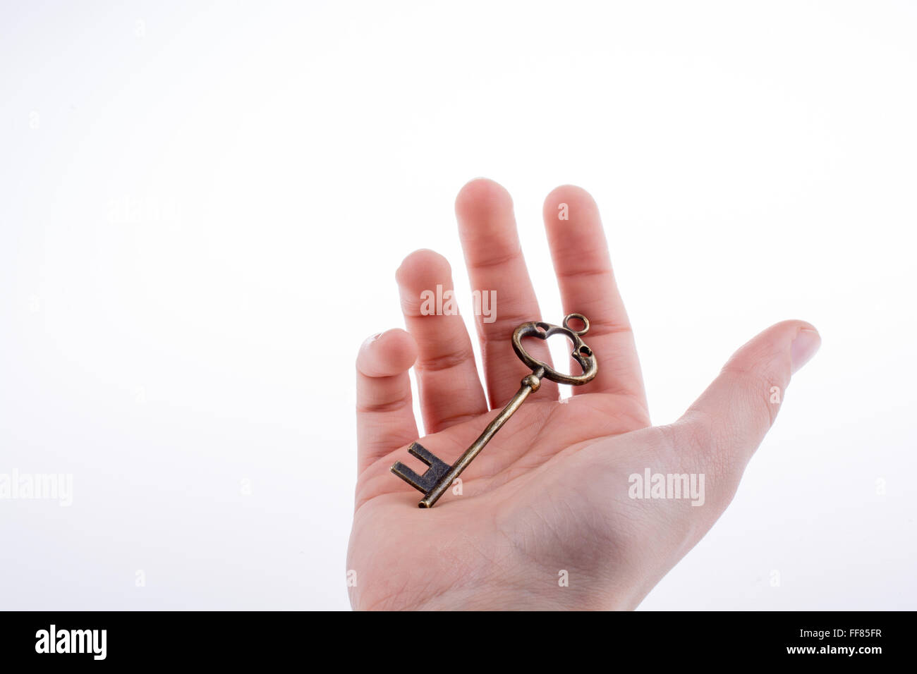 Hand holding retro key hi-res stock photography and images - Alamy
