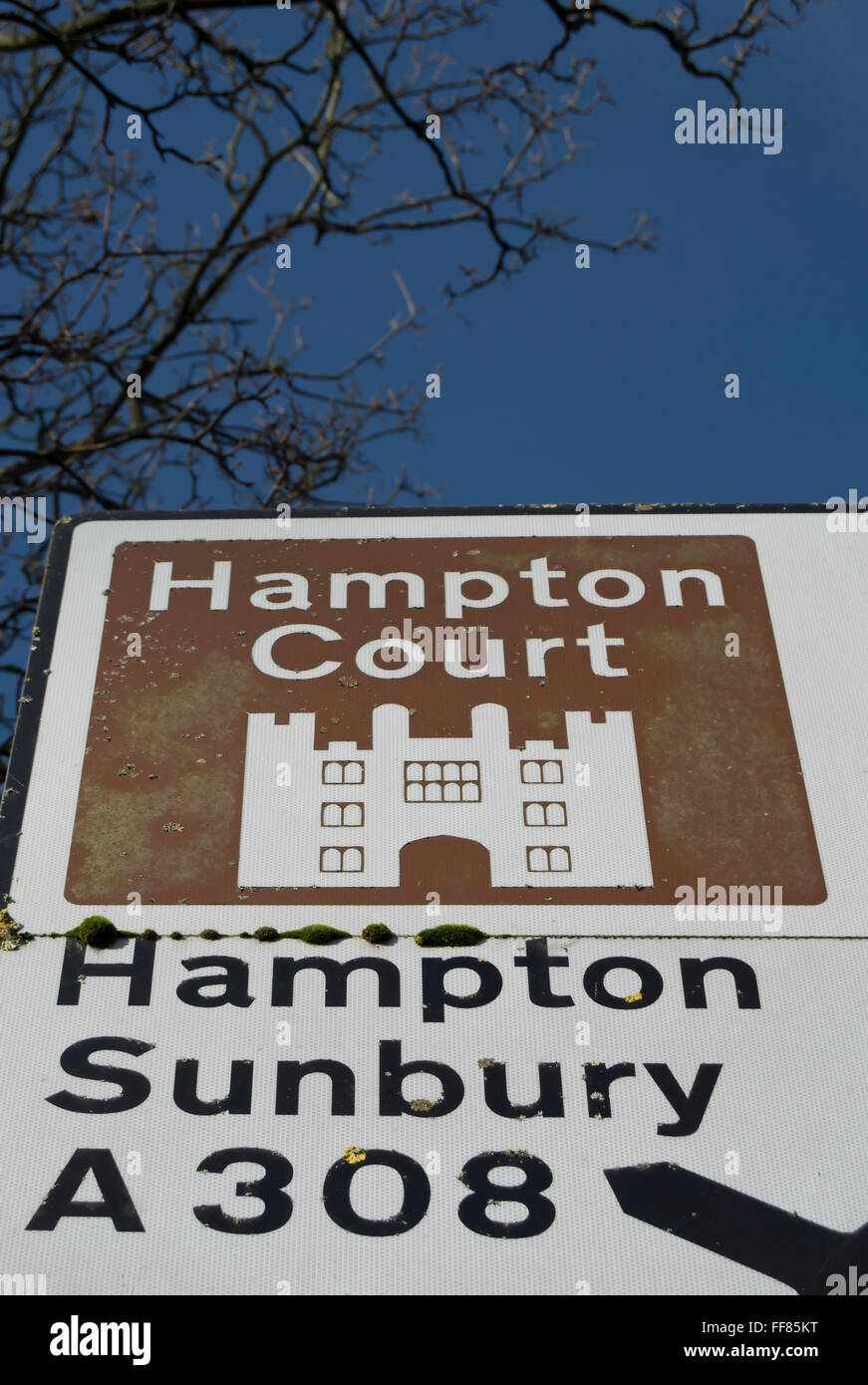 road sign giving directions to hampton court palace, and hampton ...