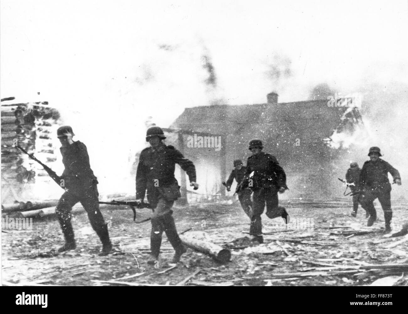 WORLD WAR II: EASTERN FRONT. /nGerman soldiers advancing through a ...