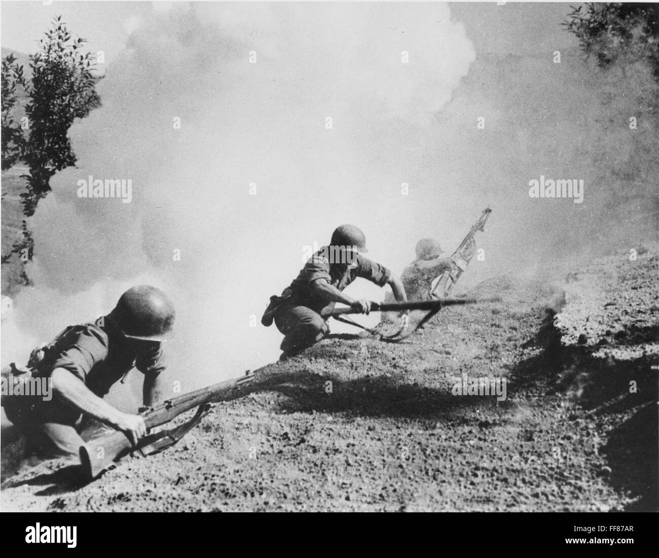 WWII: COMBAT, ITALY, 1943. /nU.S. Rangers advancing up a hillside above ...