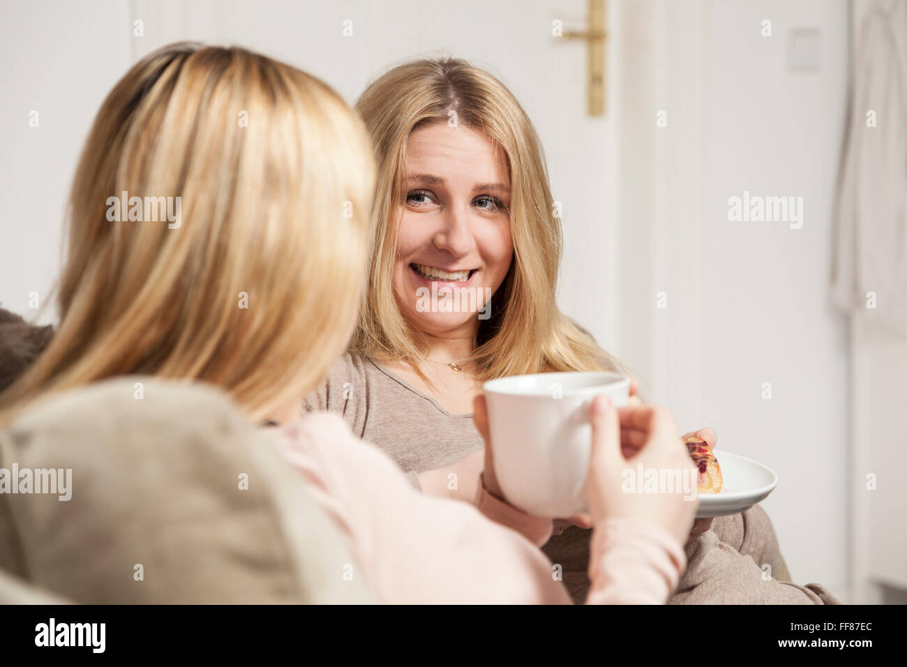 girlfriends talking in coffee gossip Stock Photo - Alamy