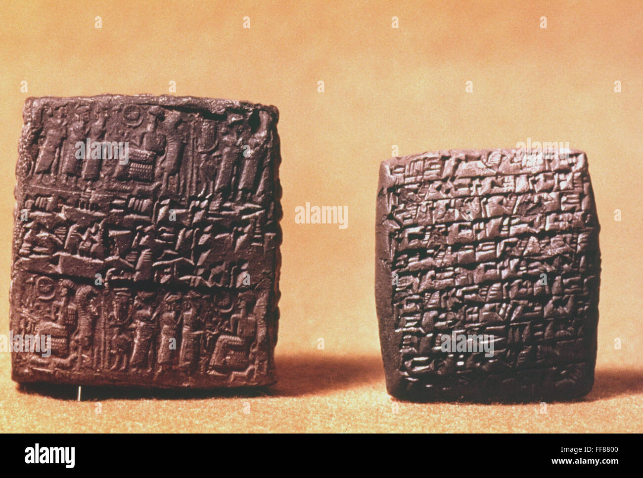 ASSYRIAN CUNEIFORM. /nA tablet with its clay envelope (a business ...