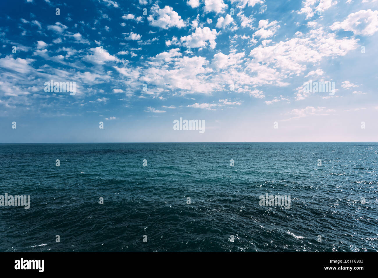 Cold Sea Ocean And Blue Sky Background With Cloudscape Stock Photo - Alamy